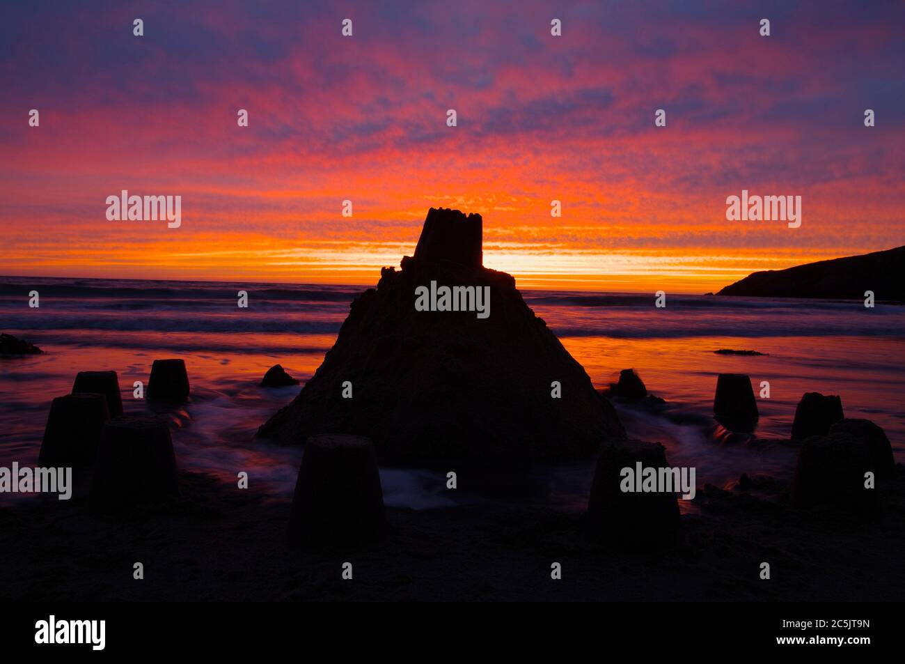 Washed away sand castle hi-res stock photography and images - Alamy