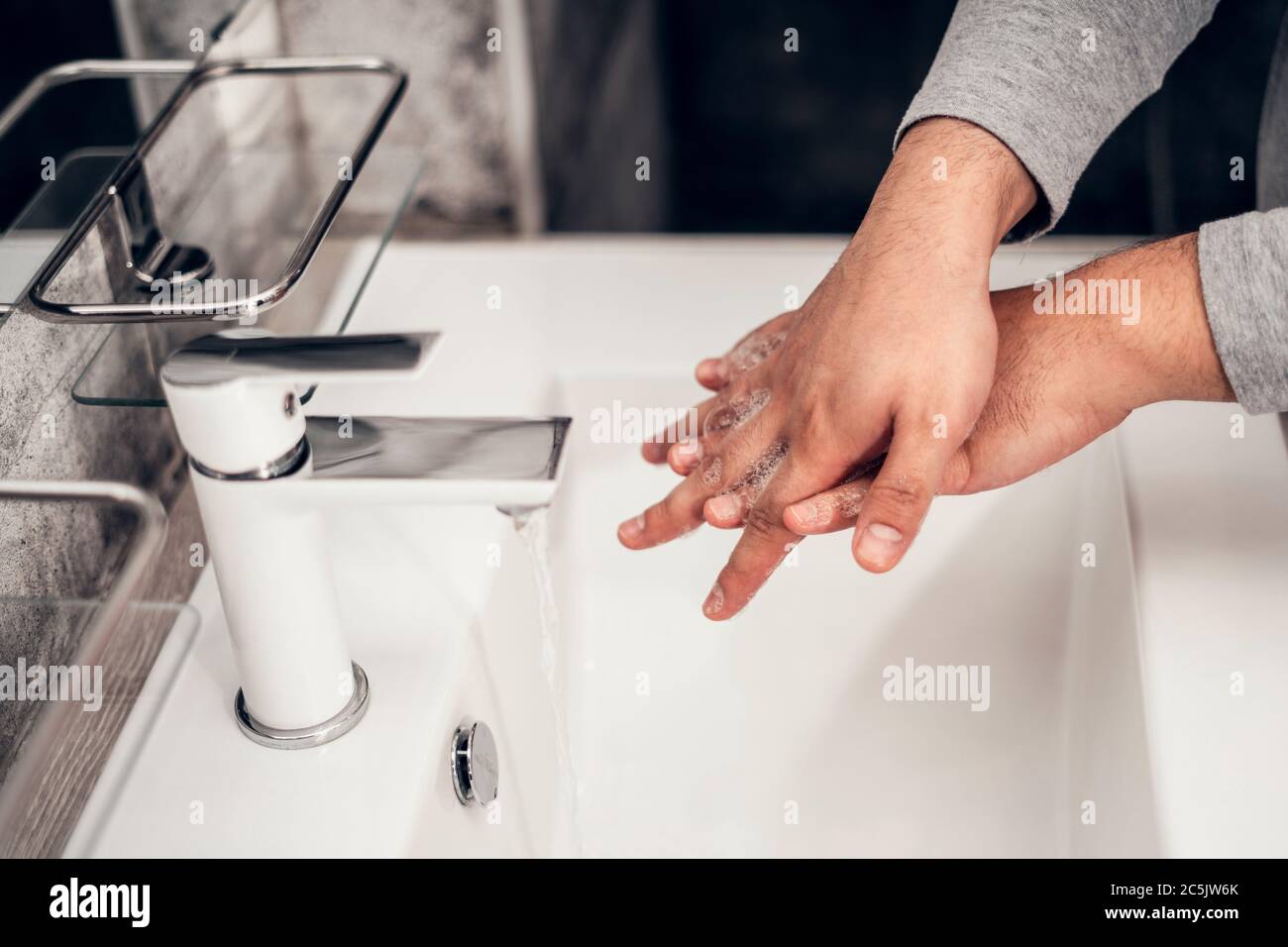 Coronavirus. Proper washing and handling of hands. Liquid antibacterial ...