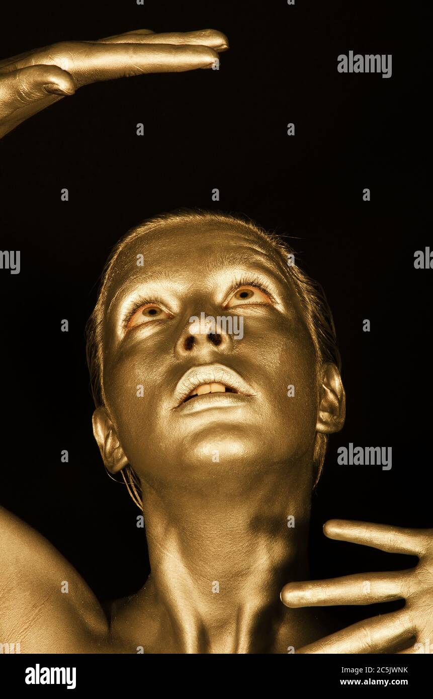 Golden lady hi-res stock photography and images - Alamy