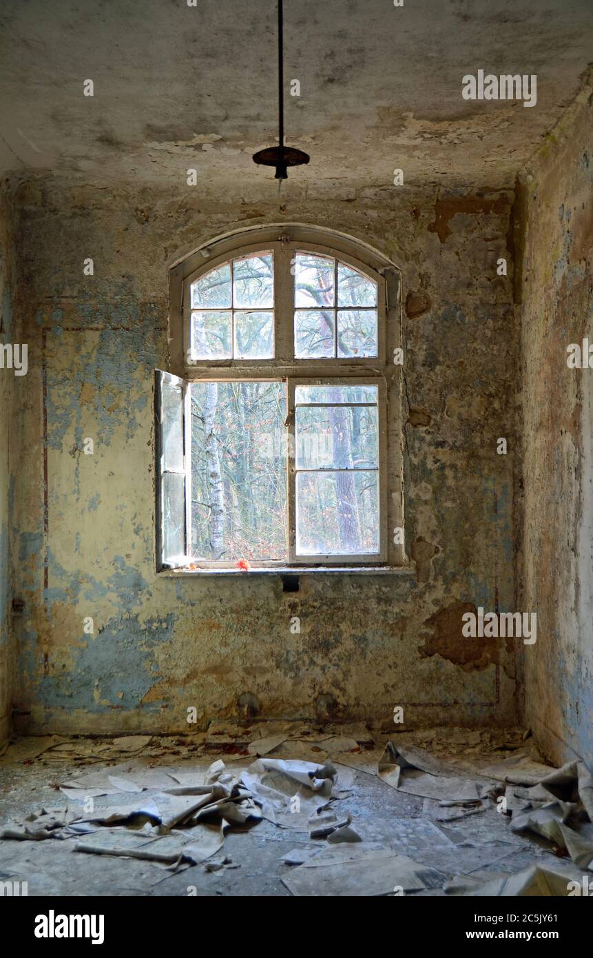 Open window in an abandoned building Stock Photo - Alamy