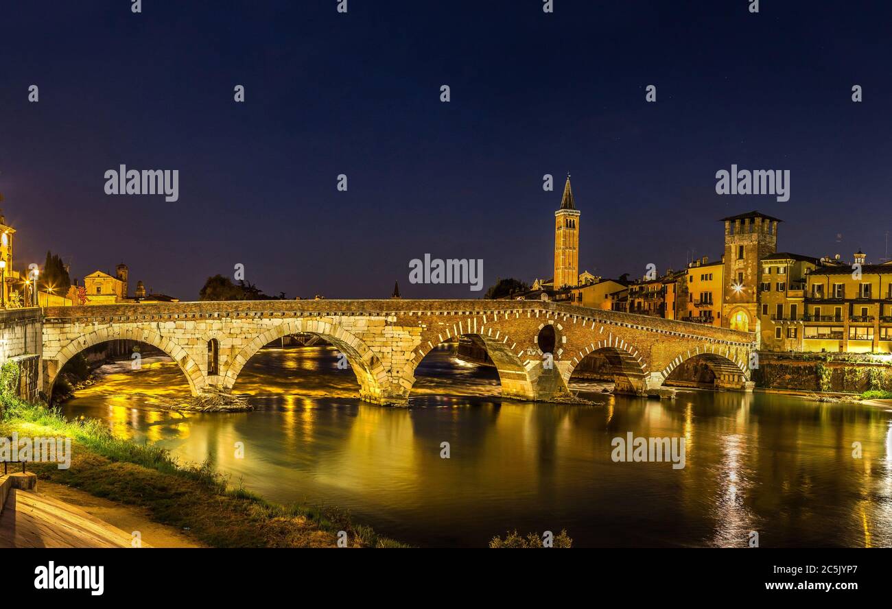 Ponte di Pietra. Bridge in Verona in a summer night, Italy Stock Photo ...
