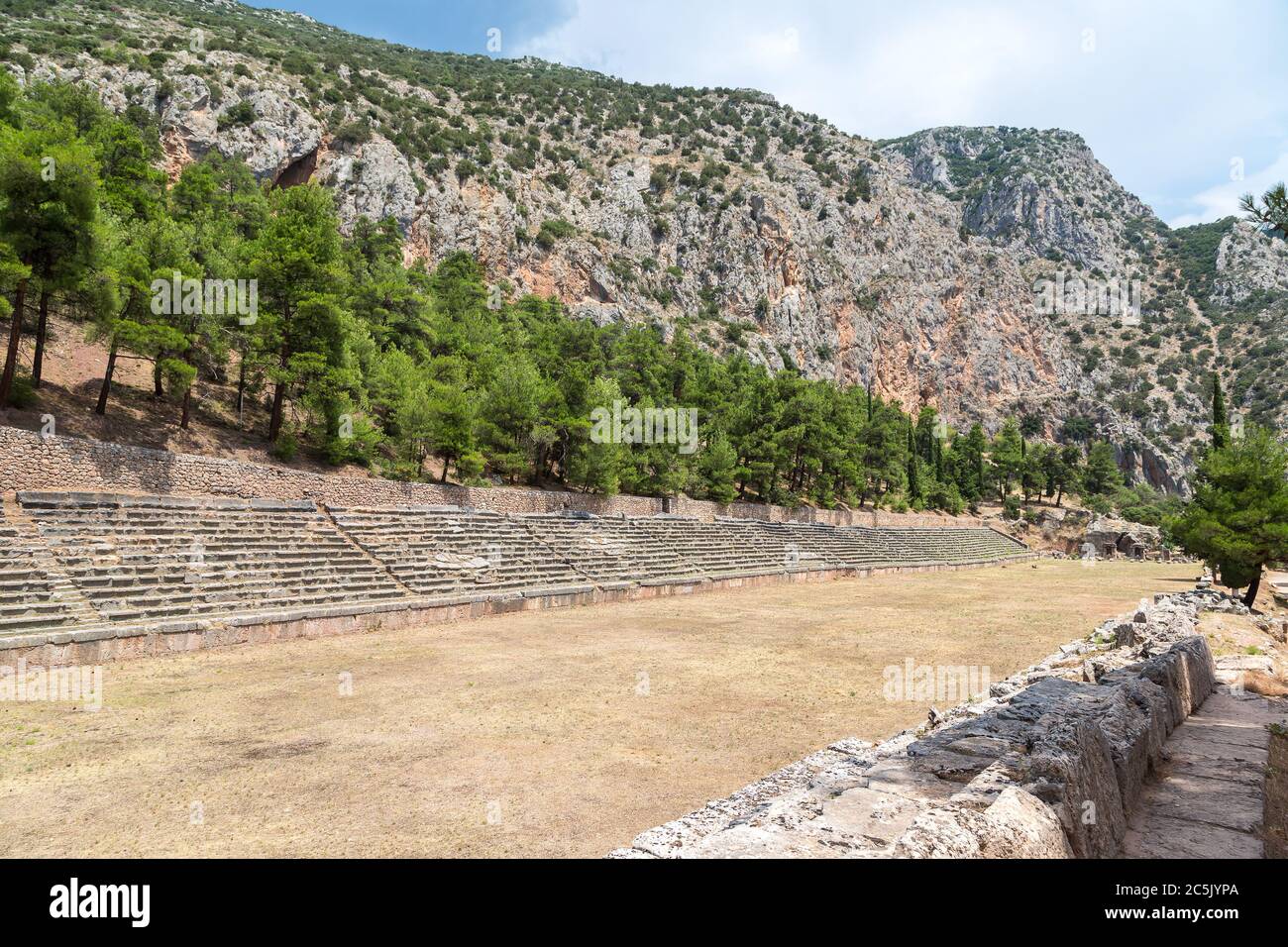 Ancient stadium in Delphi, Greece in a summer day Stock Photo - Alamy