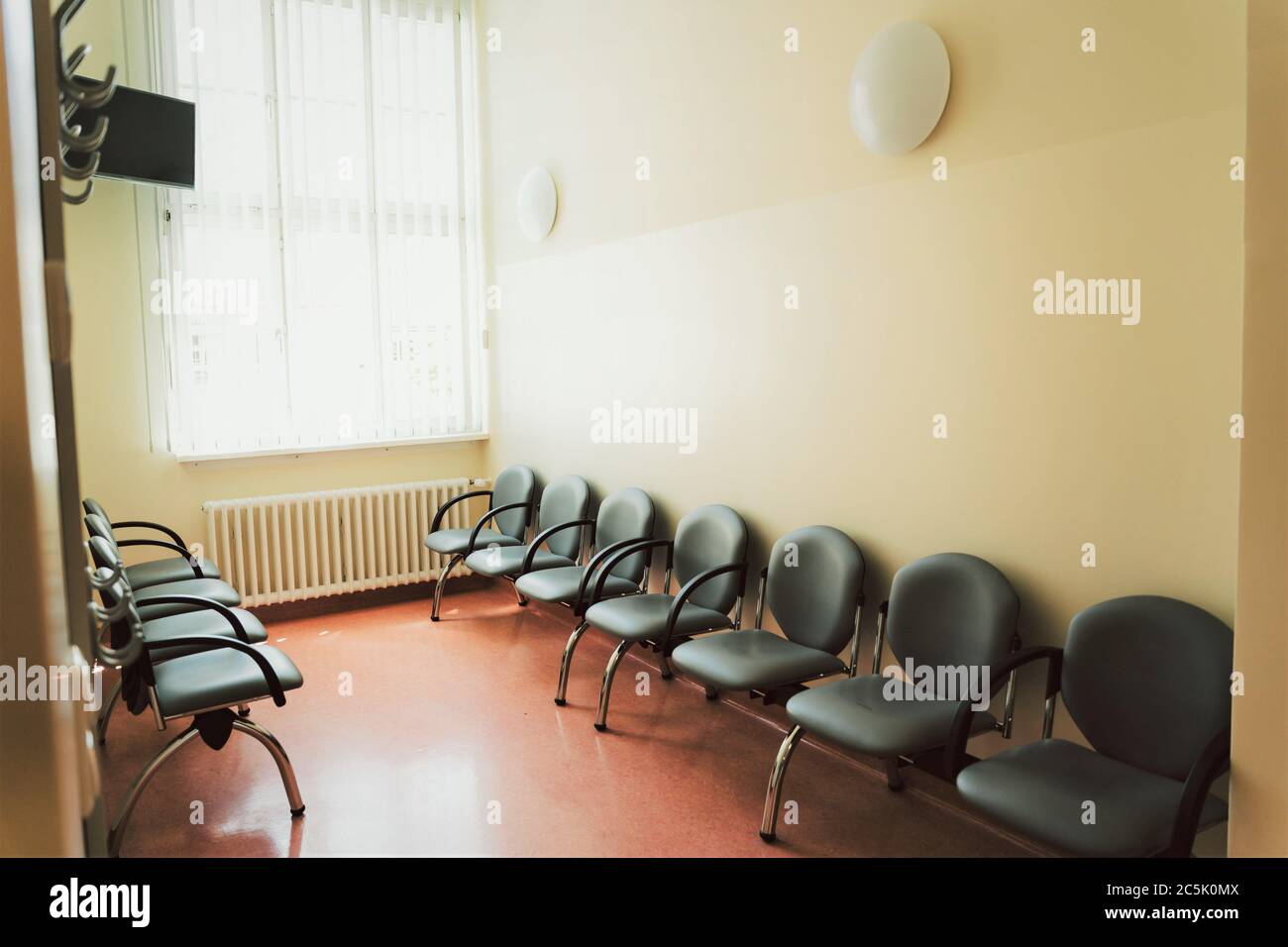 Empty interior waiting room at medical office Stock Photo - Alamy