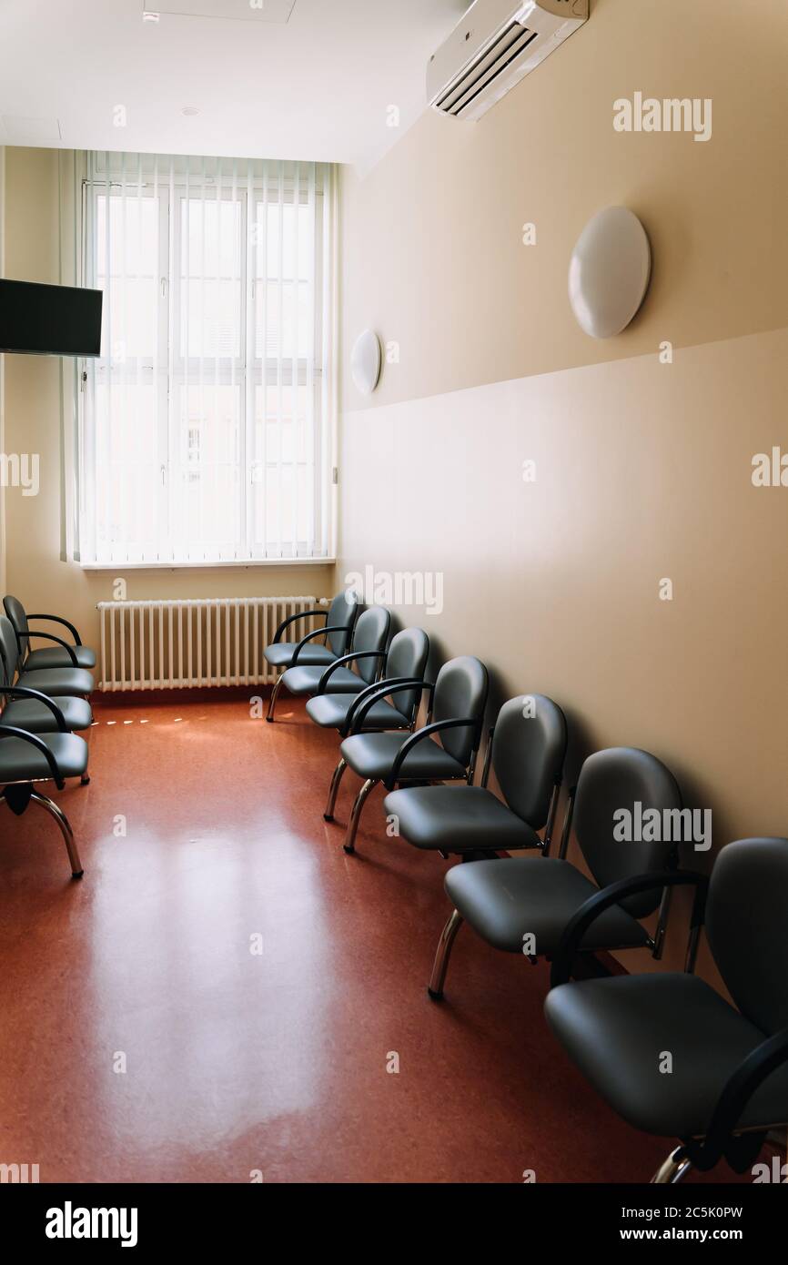 Empty interior waiting room at medical office Stock Photo - Alamy