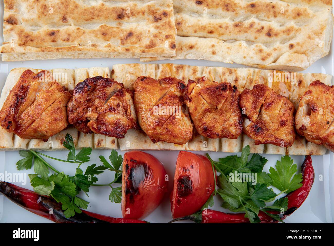 Turkish cuisine chicken skewer. Traditional grilled chicken Shish Kebab ...