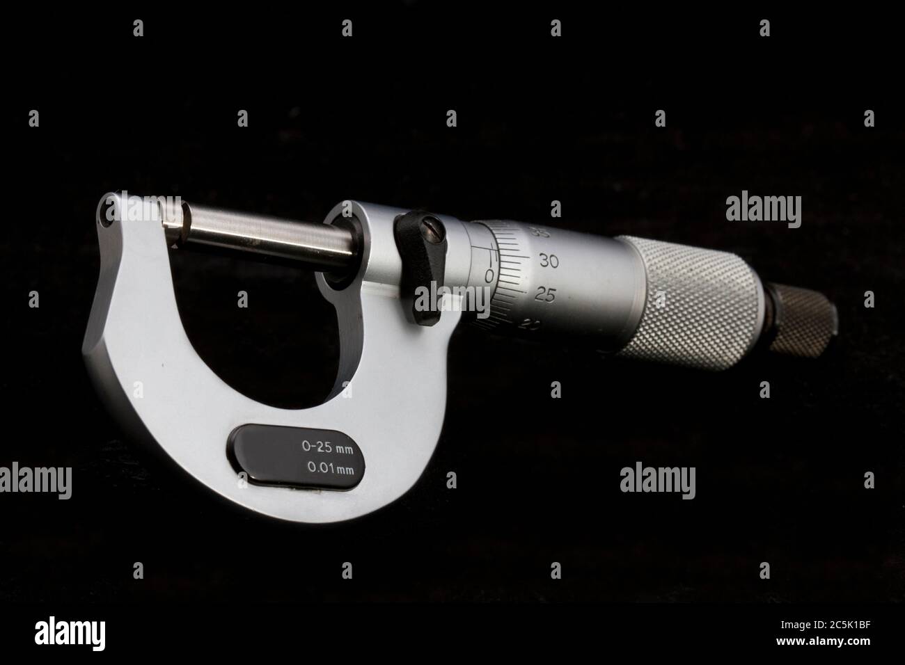 This is a close up image of an engineering micrometer used for the ...