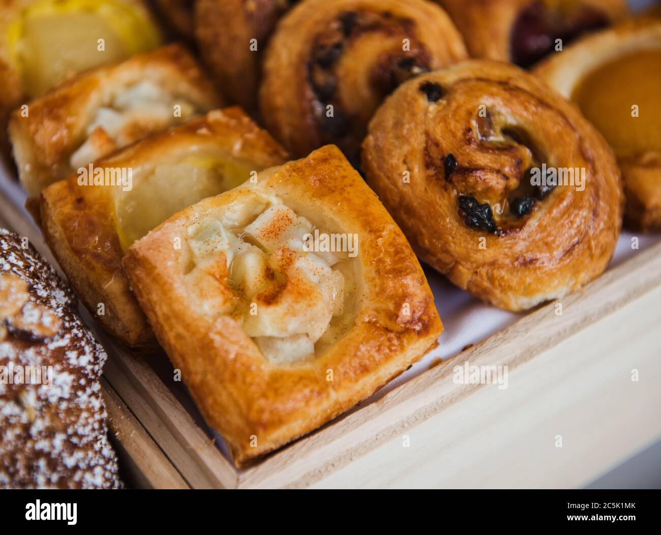 Tray of pastries being served Stock Photo - Alamy