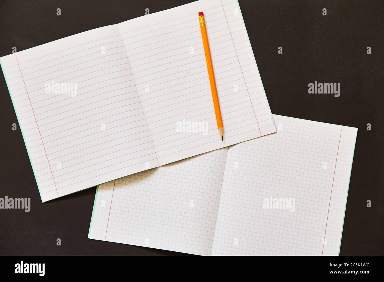 exercise book with pencil Stock Photo - Alamy