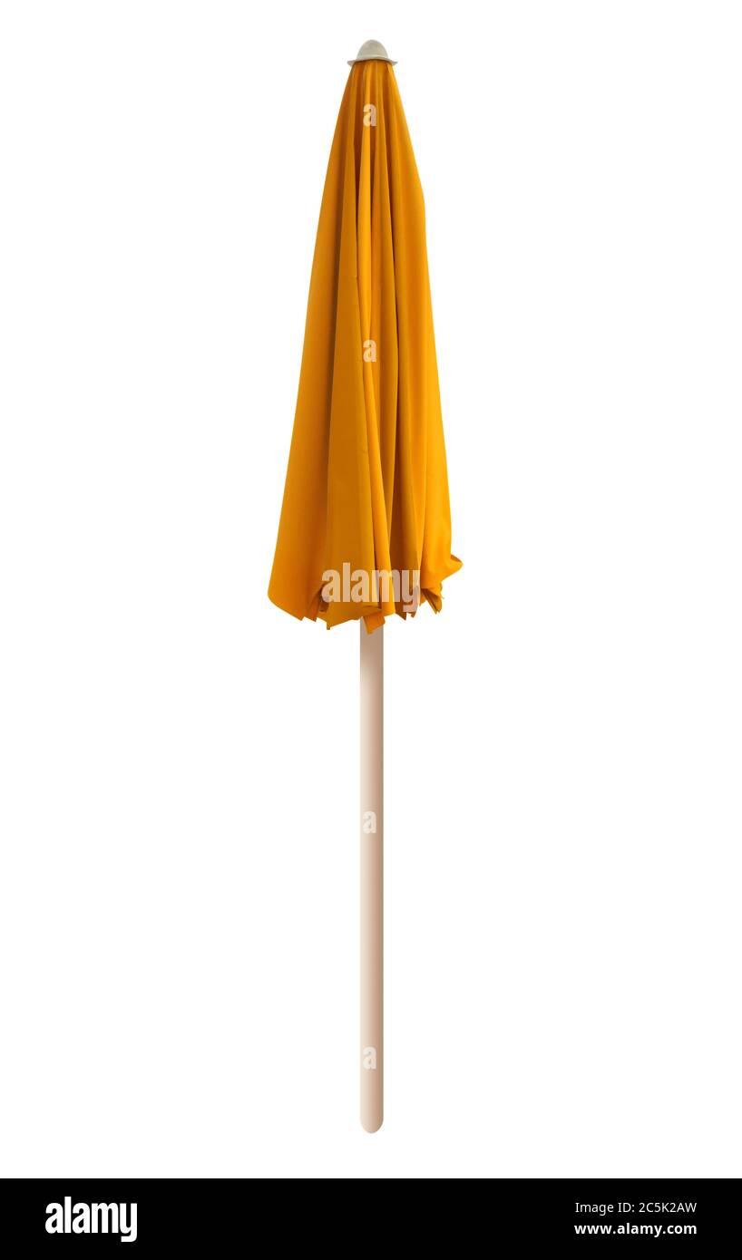 Closed yellow beach umbrella isolated on white. Clipping path included ...