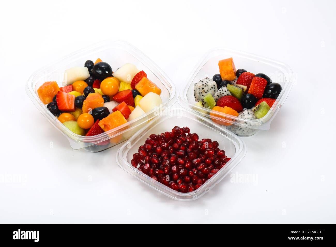 Sliced tropical fruit mix snack in the box Stock Photo - Alamy