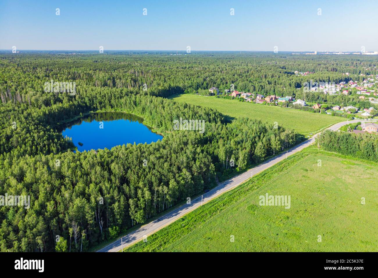 Aerial view from a drone of a lake in a forest Stock Photo - Alamy
