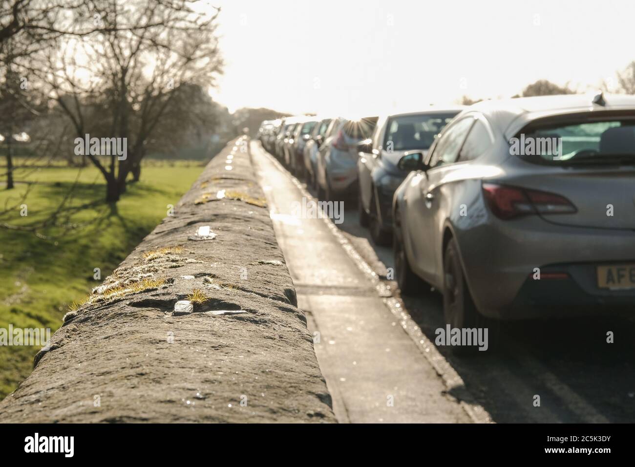 High contrast, low level view of a typical pavement seen down a one way ...