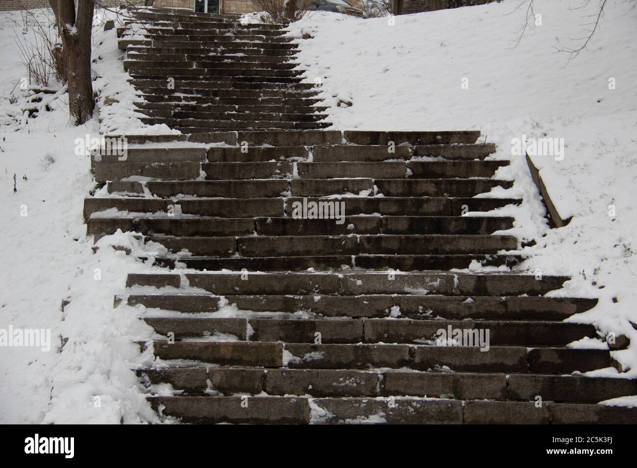 Stairs up in the snow. A stone stairs. The winter day Stock Photo - Alamy