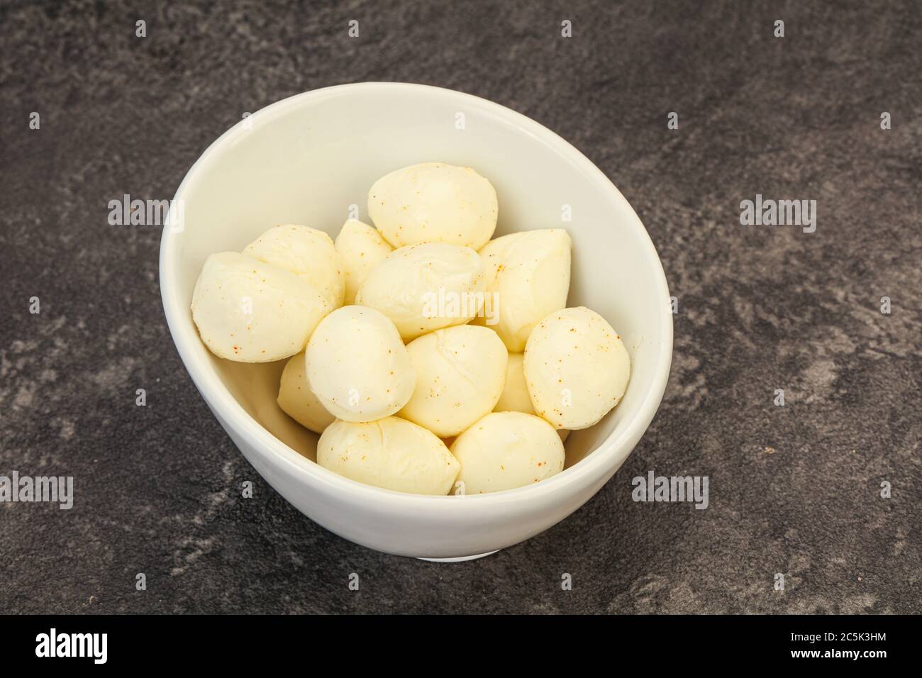 Natural tasty baby Mozarella cheese in the bowl Stock Photo - Alamy