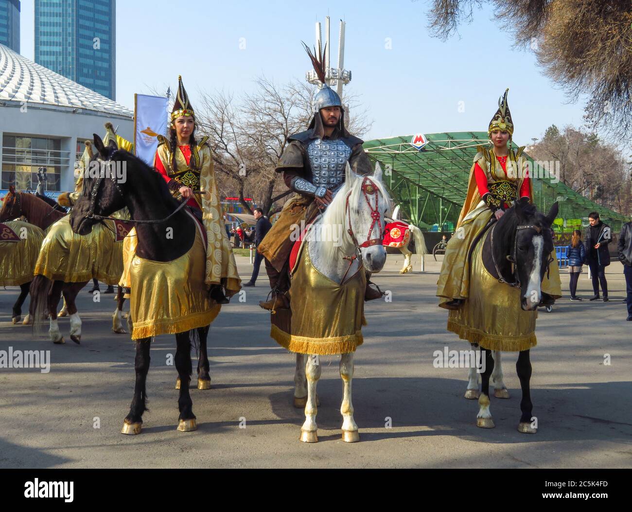 Almaty, Kazakhstan - March 21, 2019: Local people on the horses at ...