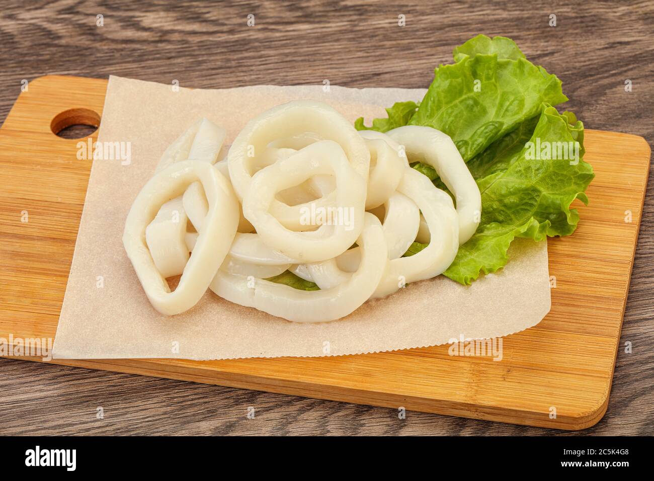 Raw squid rings ready for cooking Stock Photo - Alamy