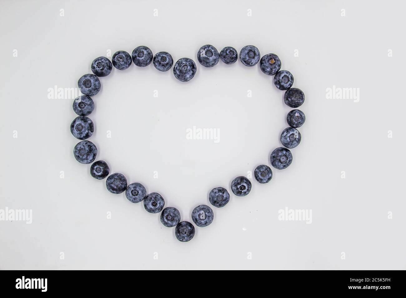 A Blueberry Heart. The heart's frame from the berries. Beautiful ...