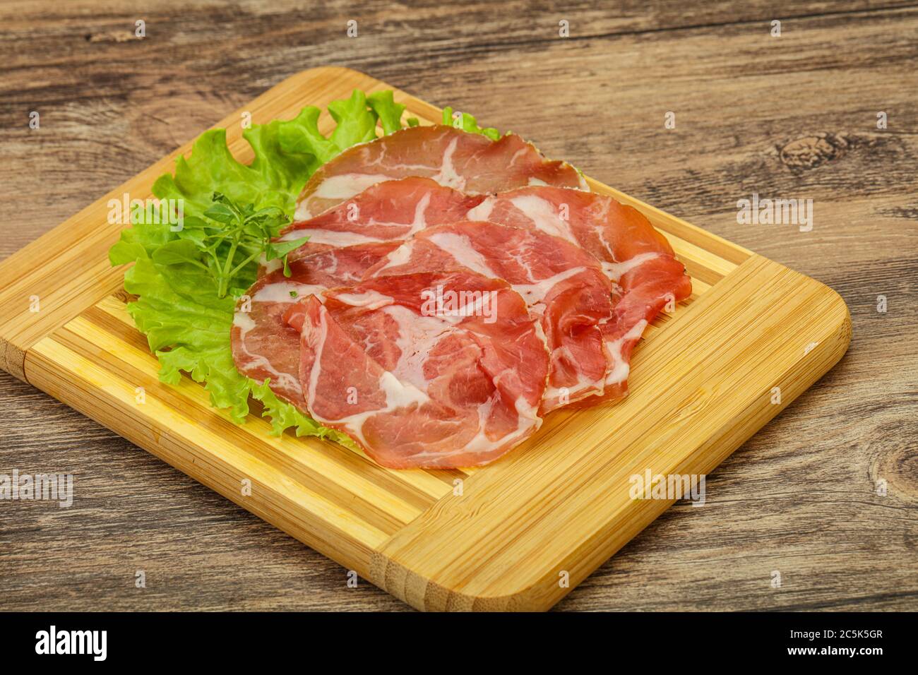 Delicous Smoked pork neck slices snack Stock Photo - Alamy