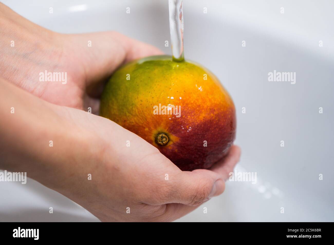 Mango girl hi-res stock photography and images - Alamy