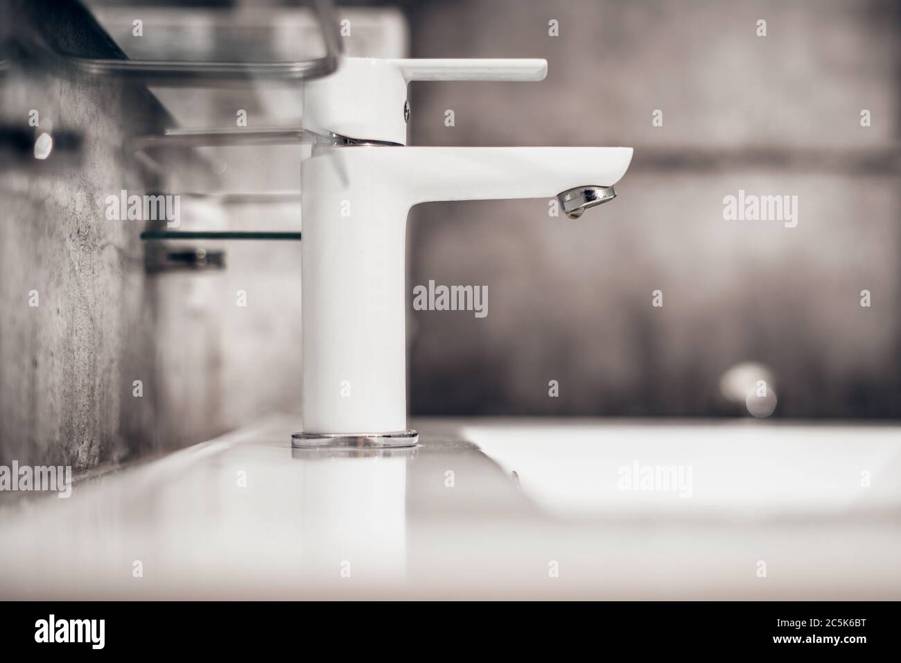 White faucet with bathroom, close-up. Hygiene and cleanliness Stock ...