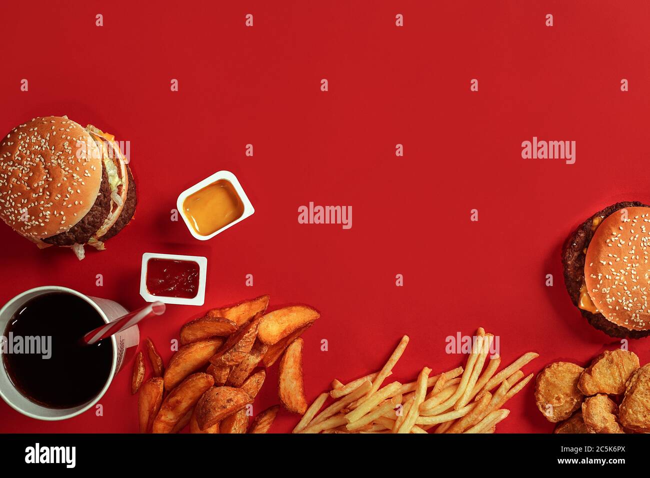 Fast food dish top view. Meat burger, potato chips and glass of drink ...