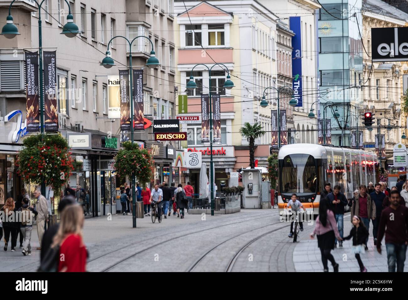 Linz, Austria - 22 September 2018: People walking at the city street ...