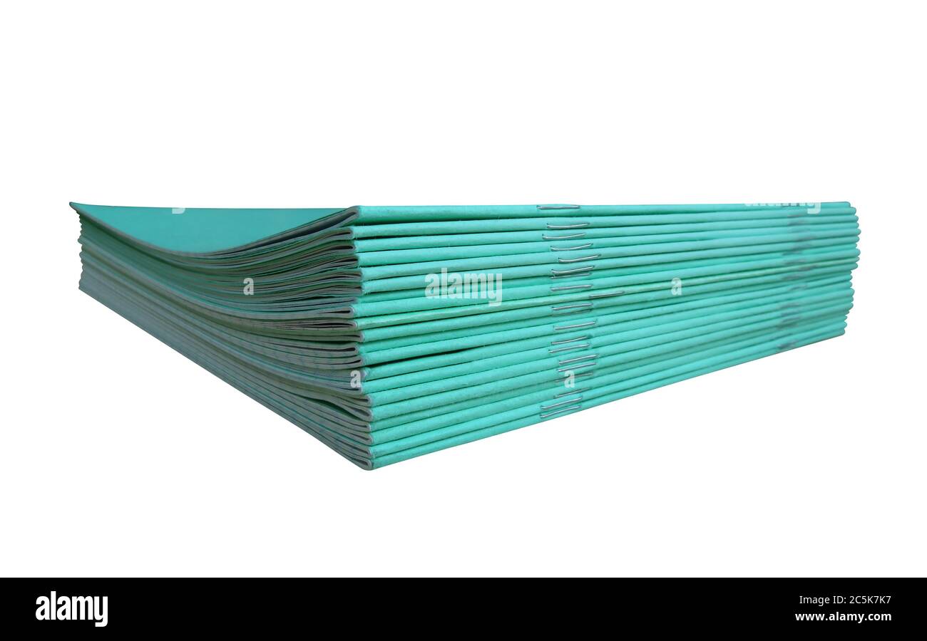 Stack of blue notebooks isolated on a white. Clipping path included ...