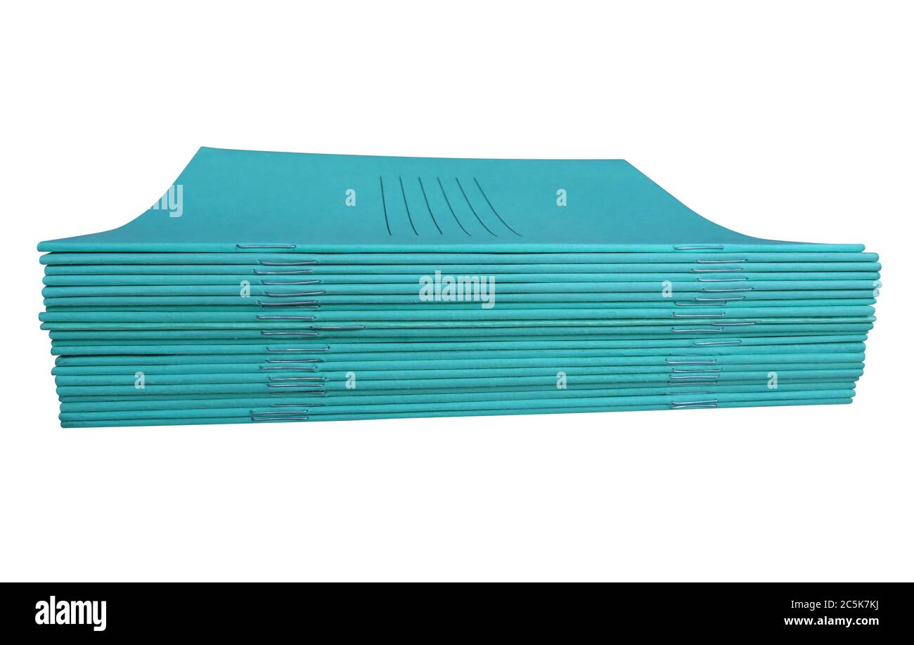 Stack of blue notebooks isolated on a white. Clipping path included ...