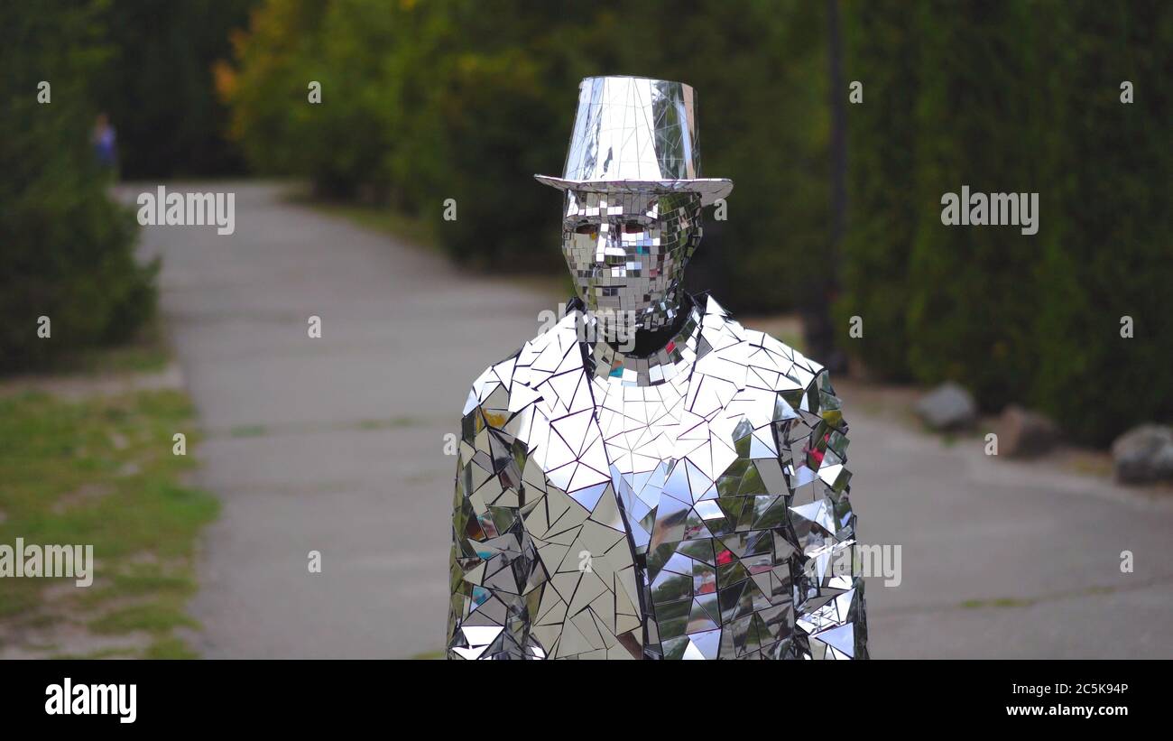 Unusual Man In Mirror Suit And Hat Is Standing In Street Like Statue Or ...
