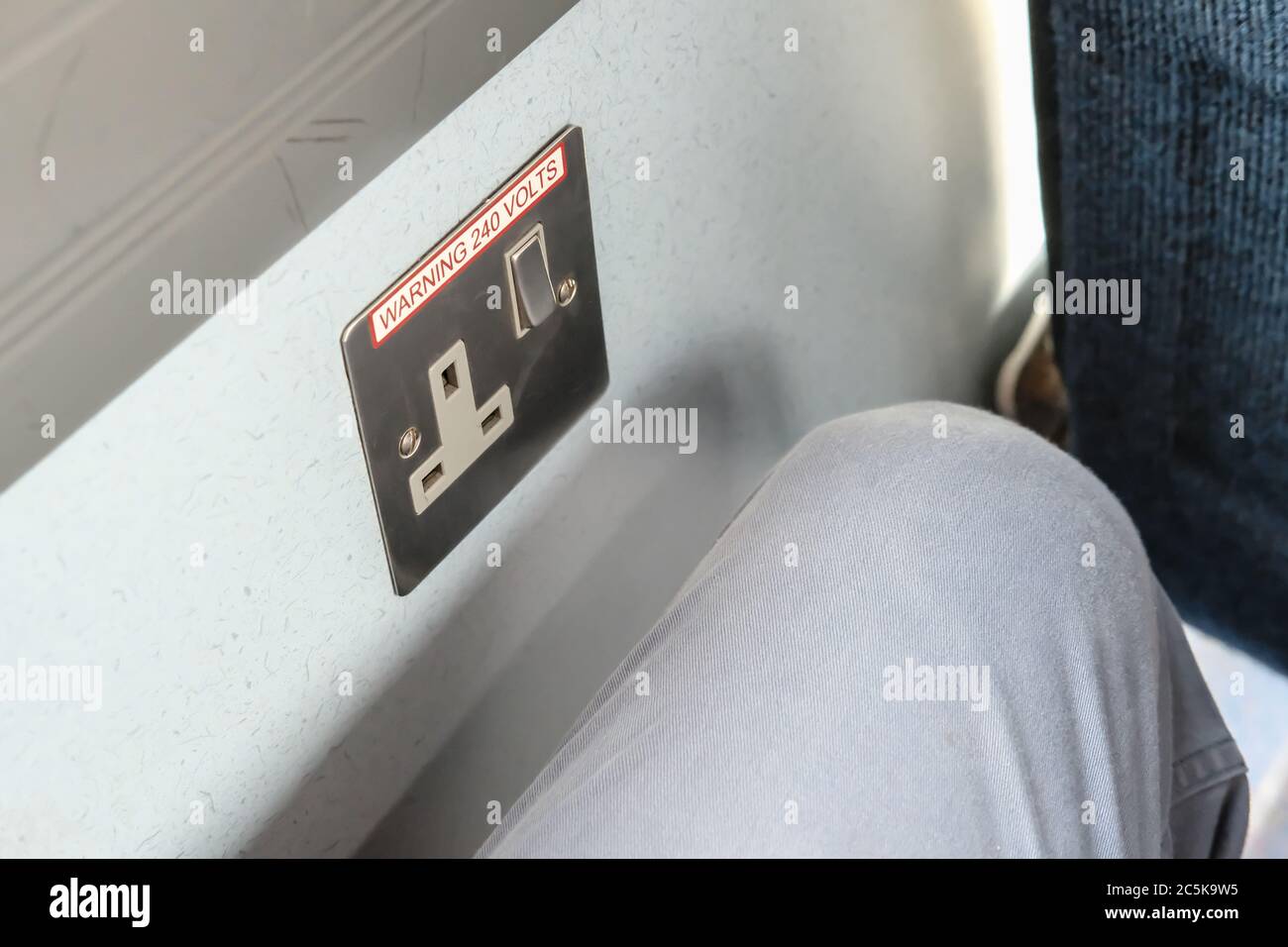 Shallow focus of a UK electrical wall outlet socket located in a ...