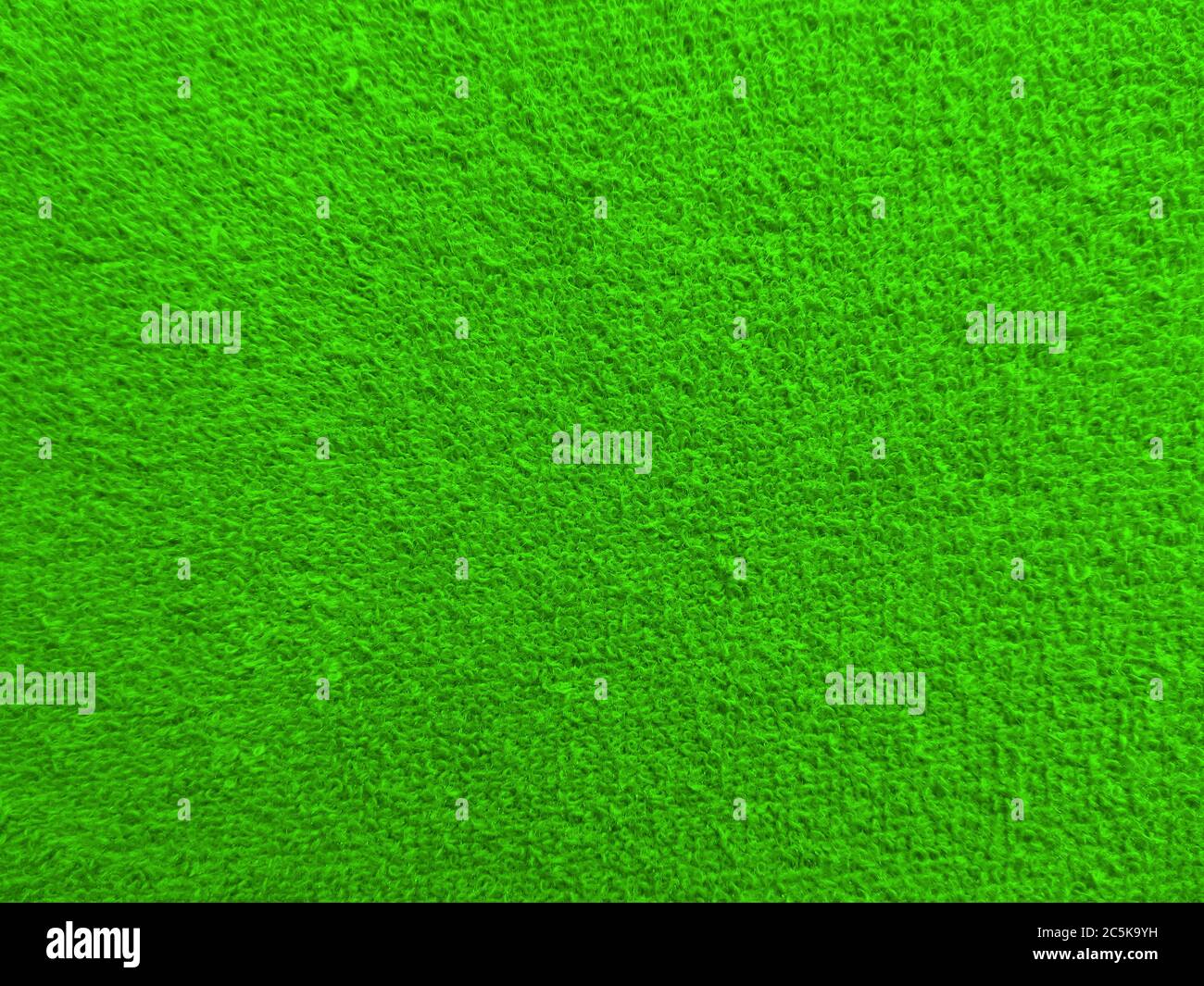 Texture of green terry fabric close up Stock Photo - Alamy