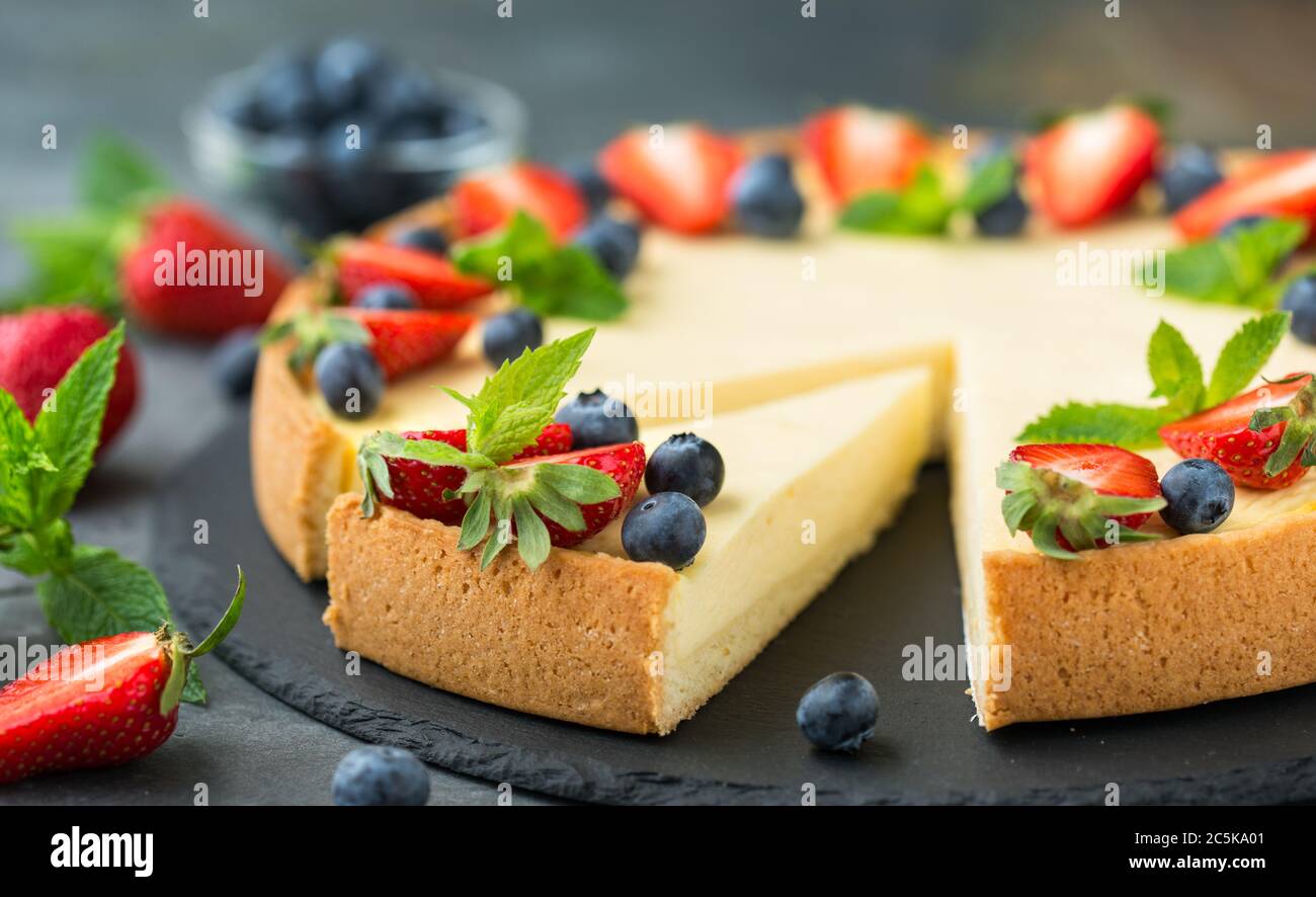 Classic homemade New York Cheesecake with fresh berry fruits Stock ...