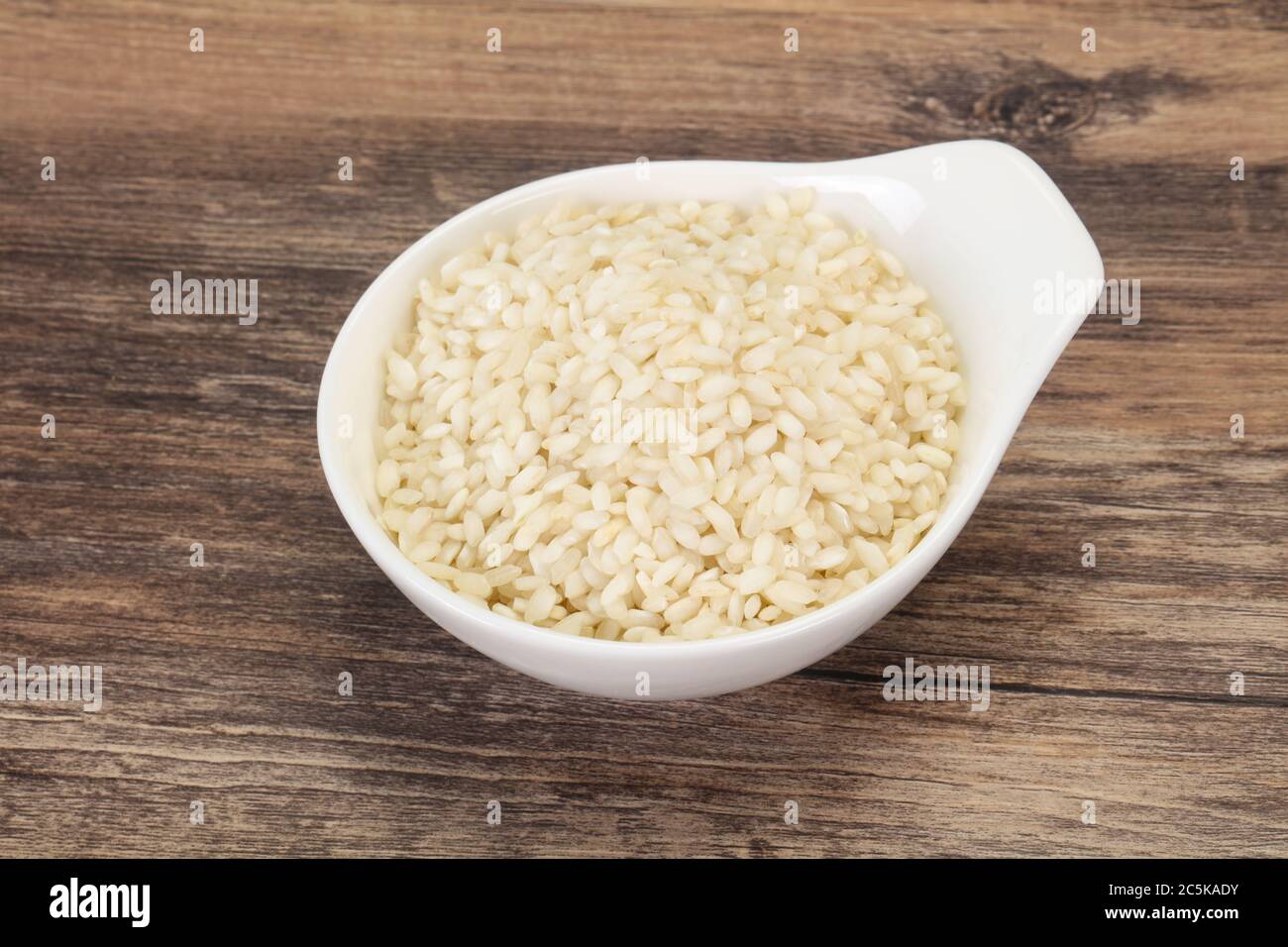 Raw Arborio rice for Italian risotto Stock Photo - Alamy