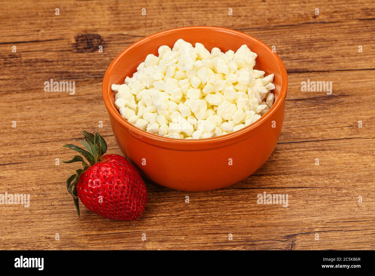 Dietary food - grain cottage cheese in the bowl Stock Photo - Alamy
