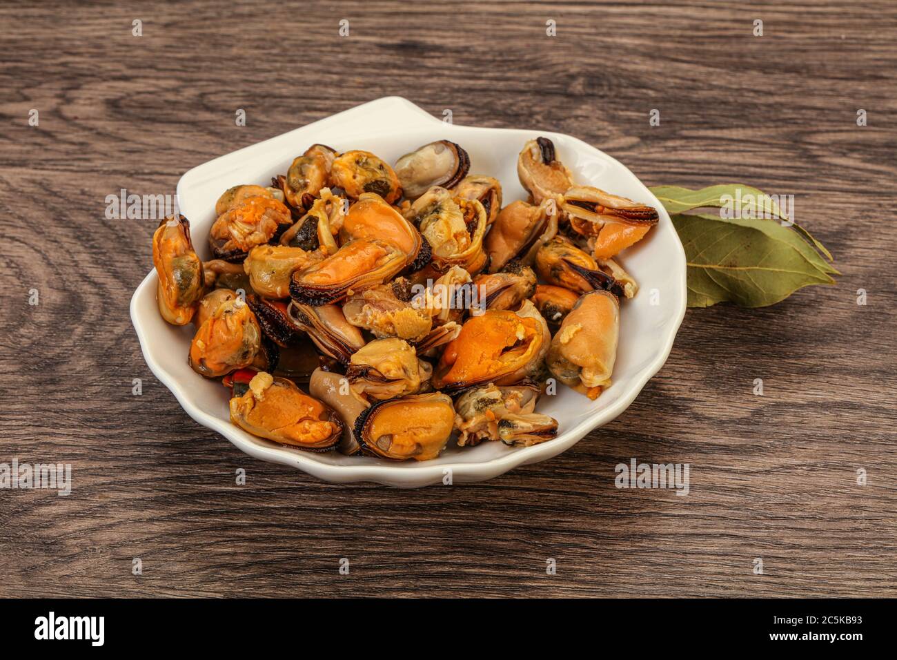 Pickled mussels with spices in the bowl Stock Photo - Alamy