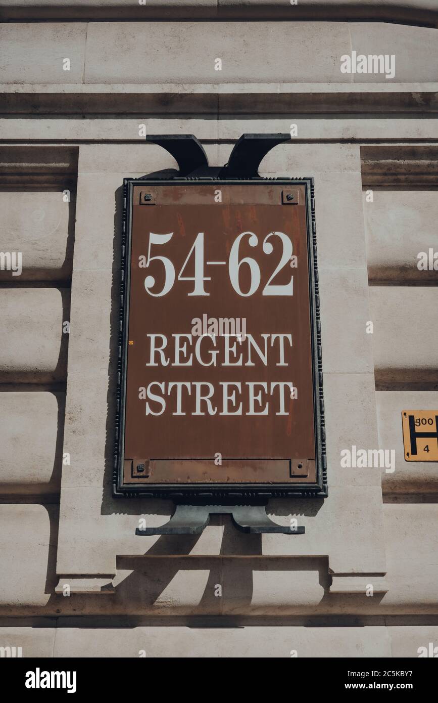 London, UK - June 13, 2020: Street name sign and building number on ...