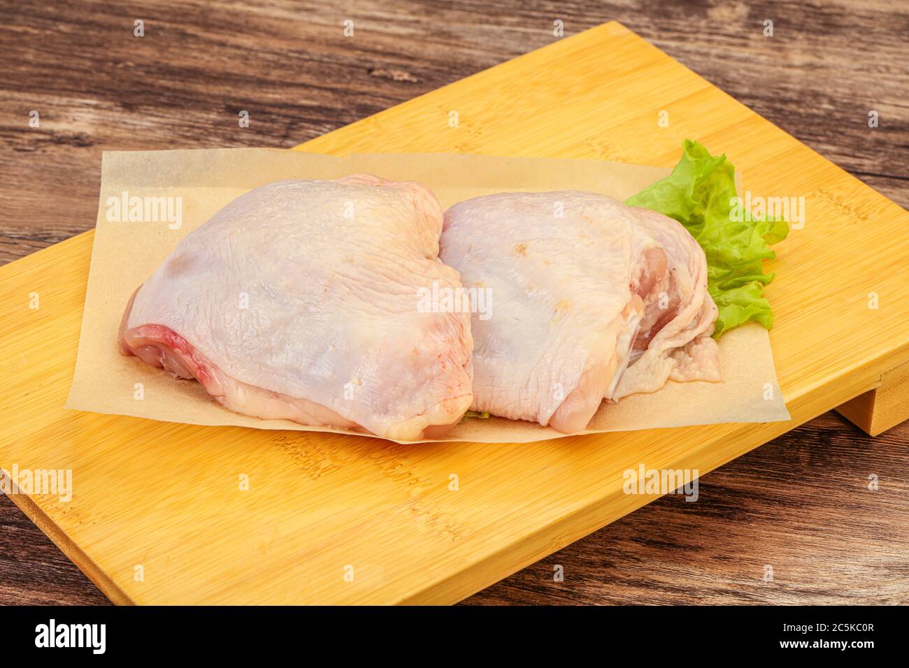 Raw chicken hip ready for cooking Stock Photo - Alamy