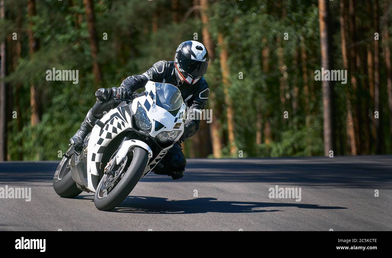 Motorcyclist in a bend hi-res stock photography and images - Alamy