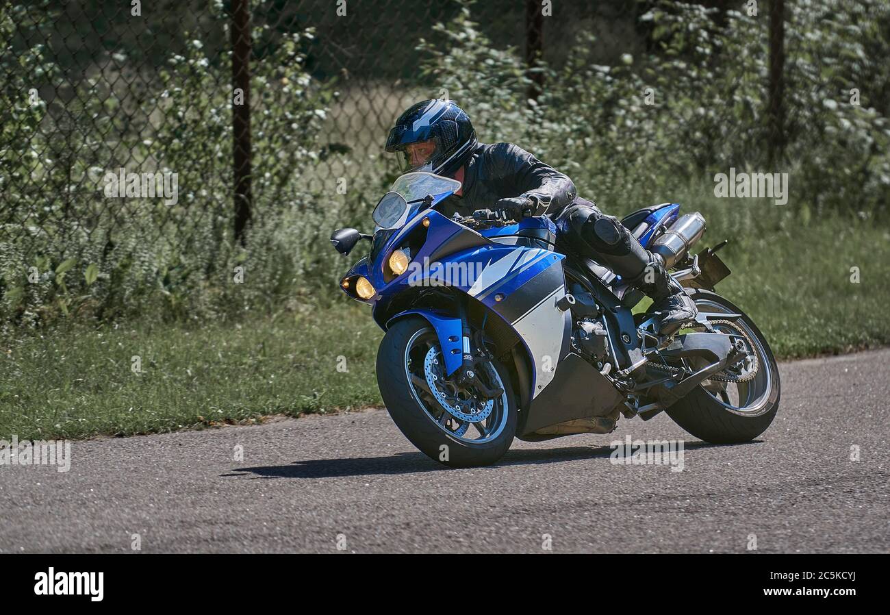 Man riding motorcycle in asphalt road curve with rural,motorcycle ...