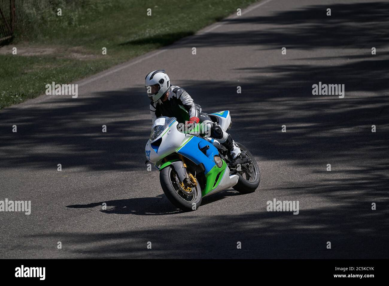 Man riding motorcycle in asphalt road curve with rural,motorcycle ...