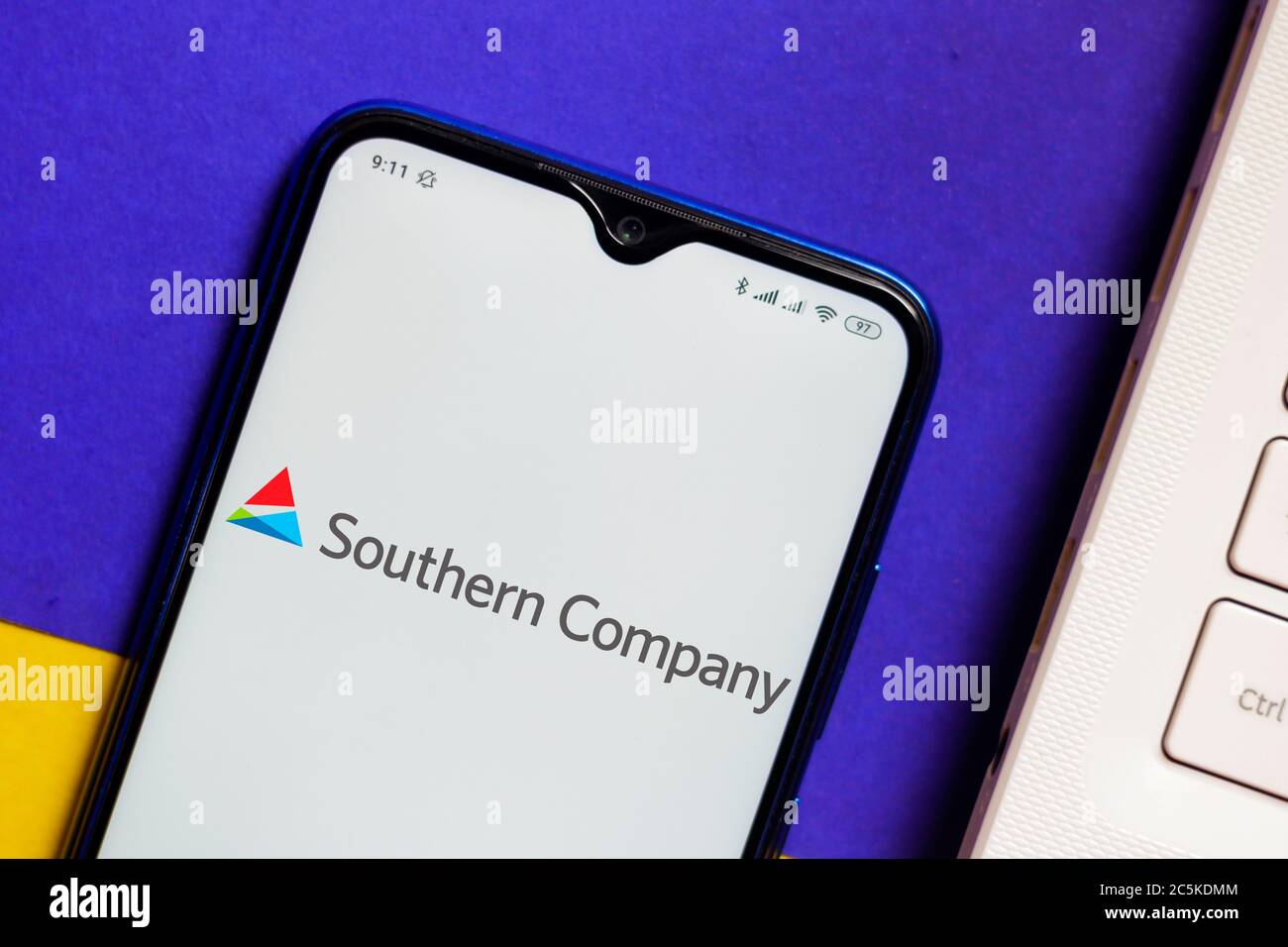 In this photo illustration the Southern Company logo seen displayed on ...