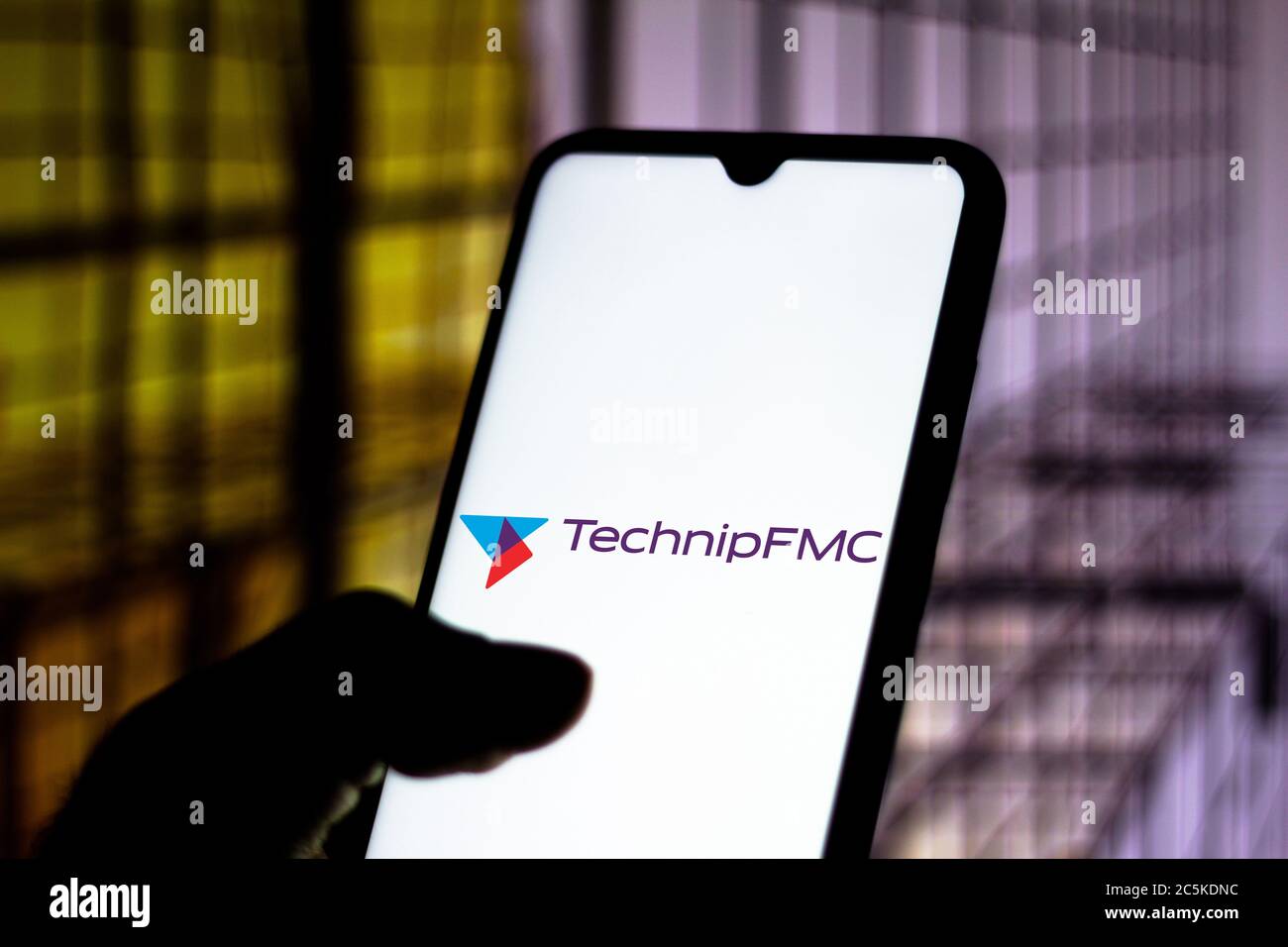 In this photo illustration the TechnipFMC logo seen displayed on a ...