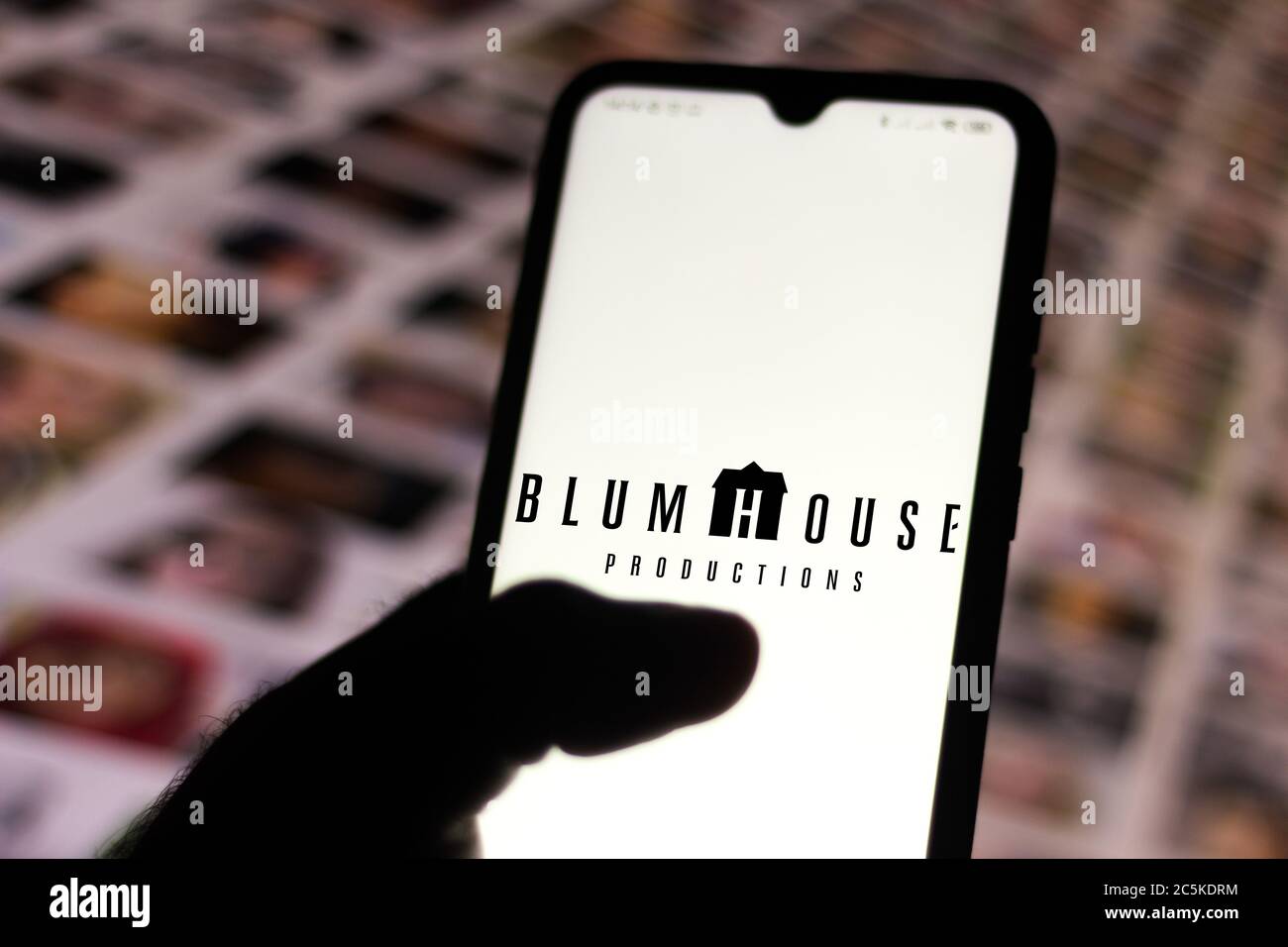 In this photo illustration the Blumhouse Productions logo seen ...