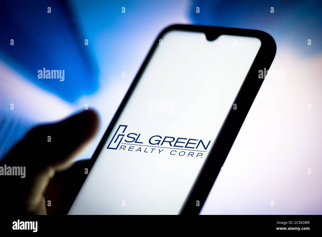 In this photo illustration the SL Green Realty logo seen displayed on a ...