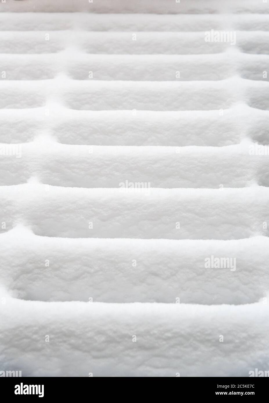 Shadow and pattern on snow surface Stock Photo - Alamy
