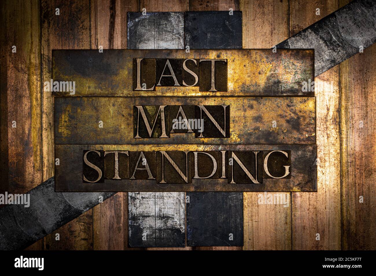 Last Man Standing text formed with real authentic typeset letters on ...