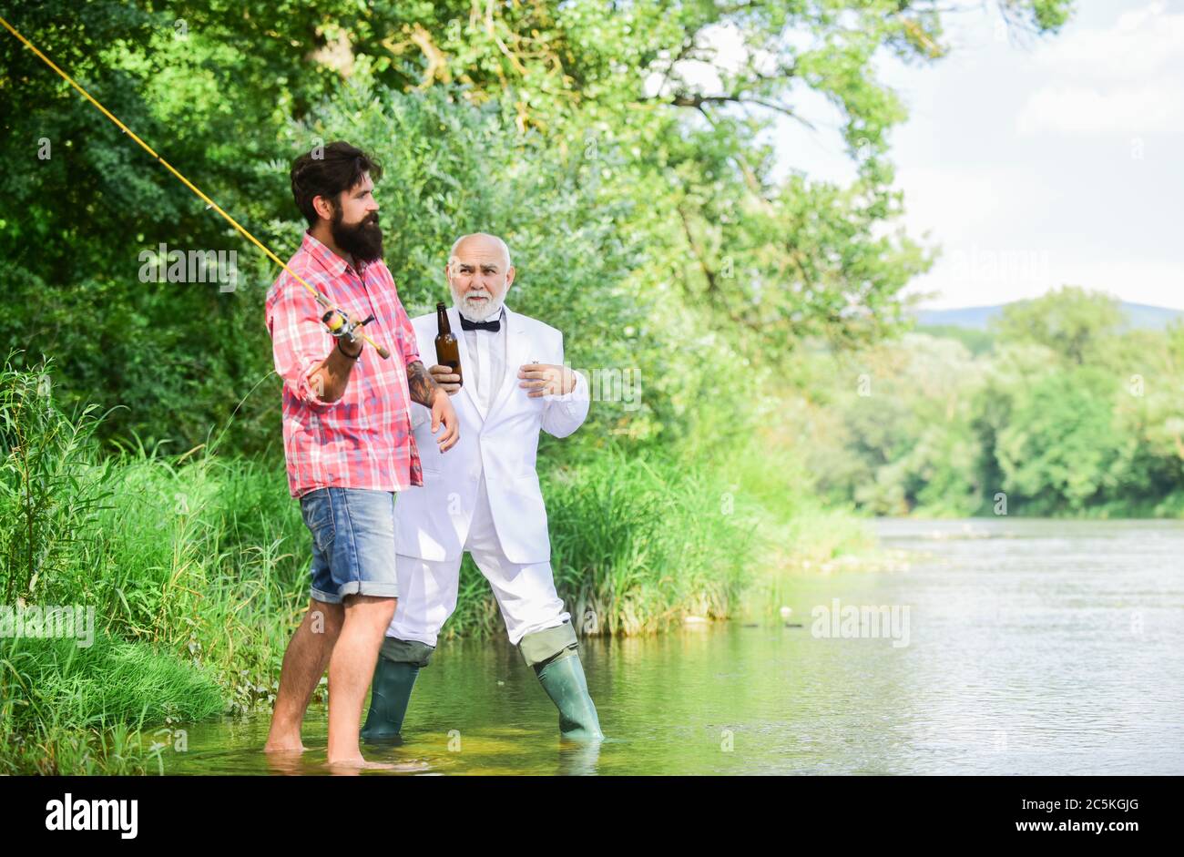 Set up rod with hook line and sinker. Fishing and drinking beer. Men ...