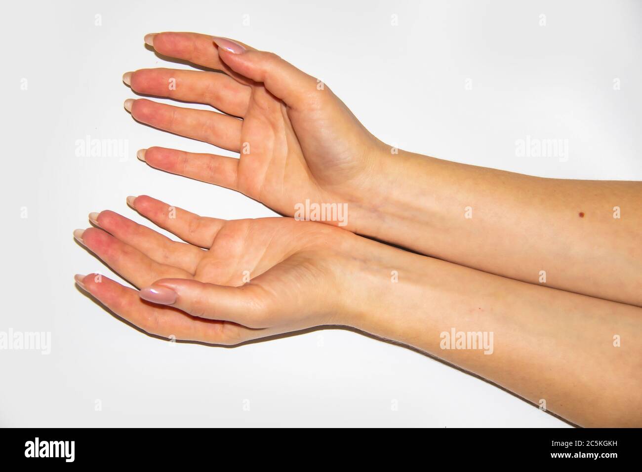 Two hands catch hi-res stock photography and images - Alamy