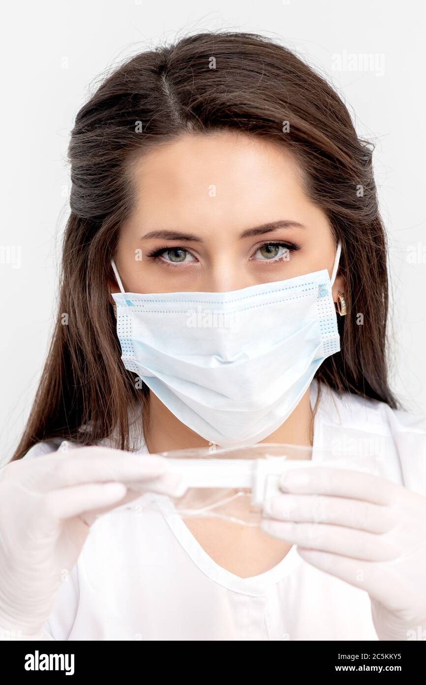 Manicure master with protective mask holding manicure nail file tool on ...