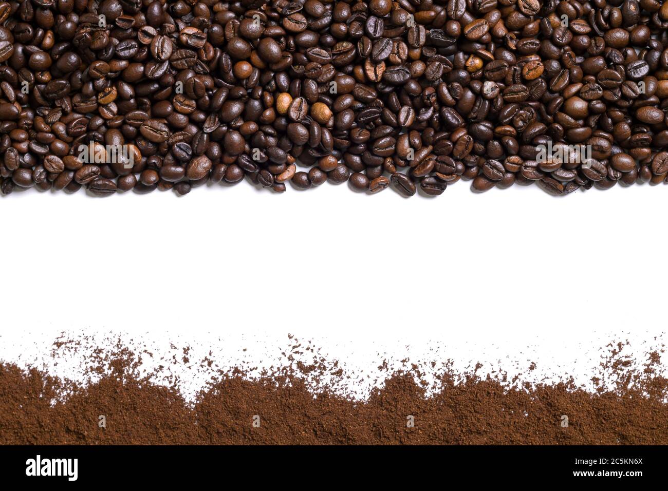 White background with coffee beans and ground coffee on below and above ...